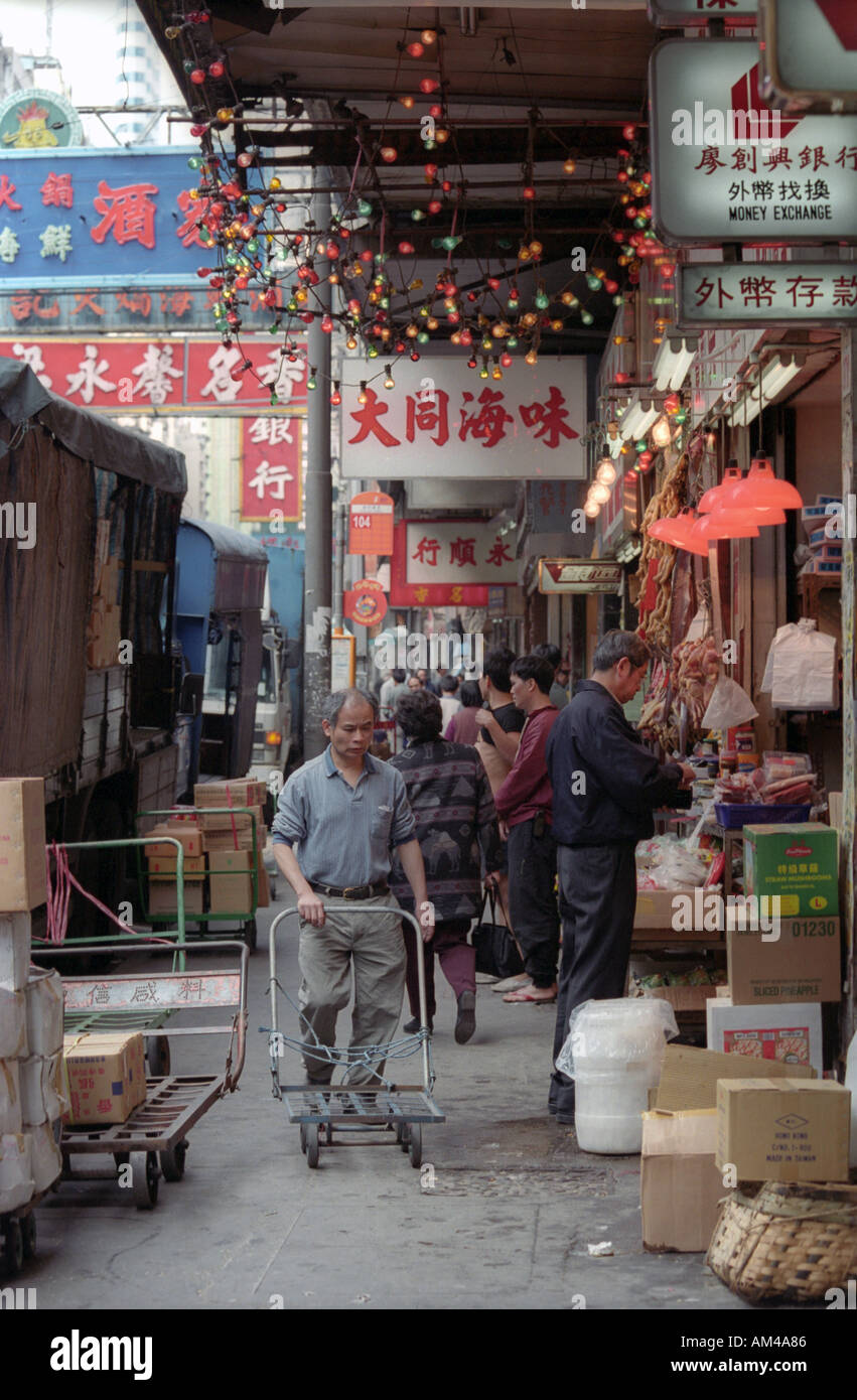 Street market as view from a side lane in Hong Kong Stock Photo - Alamy