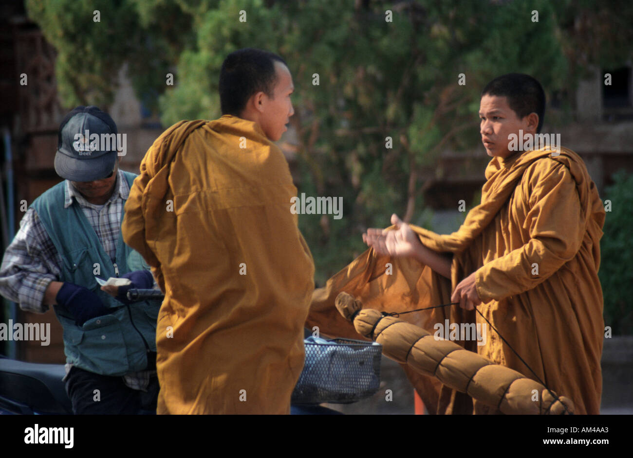 Two monks talking hi-res stock photography and images - Alamy
