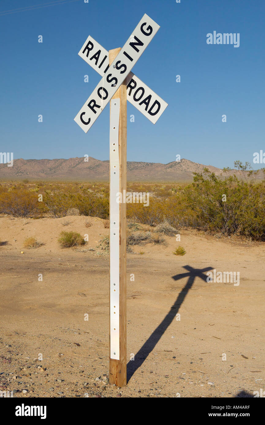 Railroad crossing sign and intersection in Mojave Desert of Southern ...