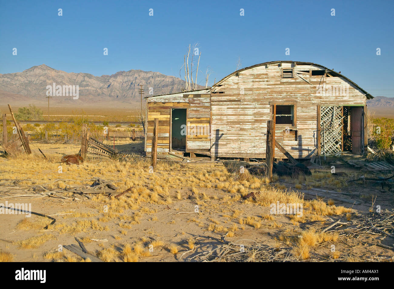 Falling down old mining buildings in mining area of Mojave Desert in ...