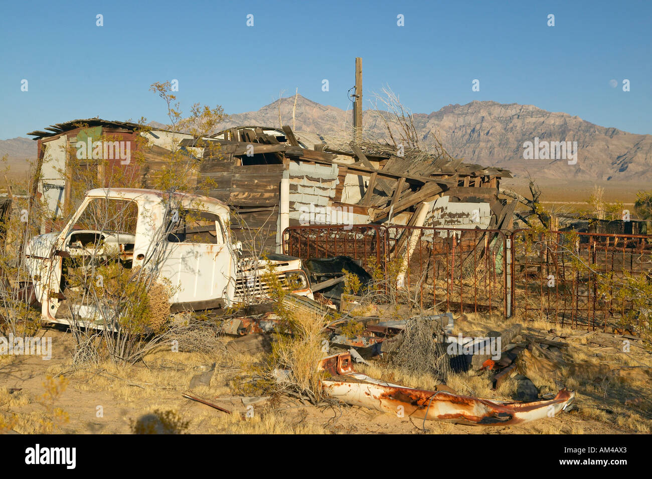 Falling down old mining buildings in mining area of Mojave Desert in ...