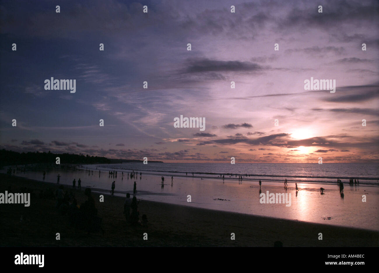 Sunset a Kuta beach in Bali Indonesia Stock Photo - Alamy