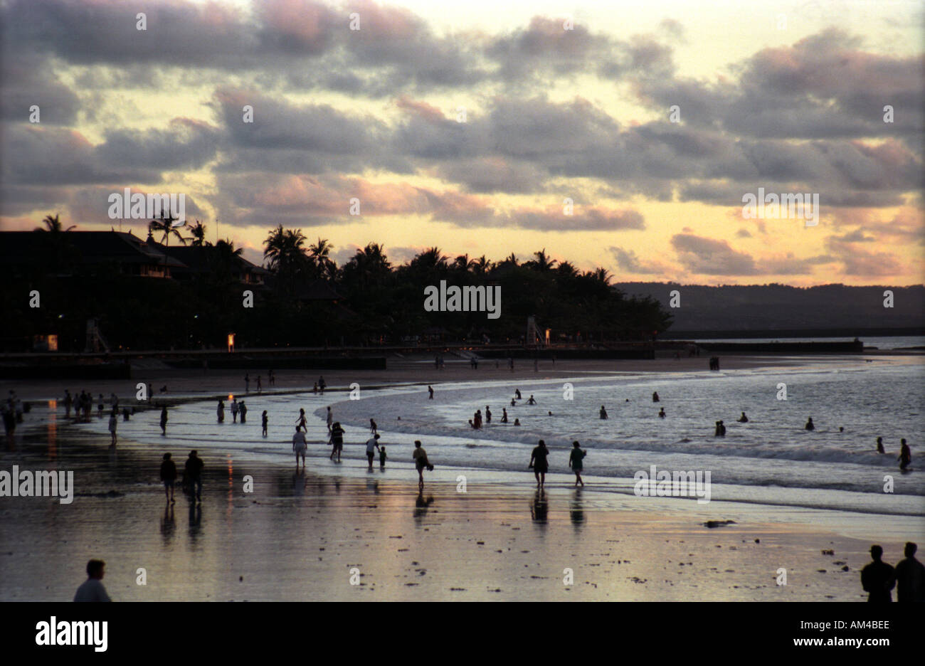 Sunset a Kuta beach in Bali Indonesia Stock Photo - Alamy