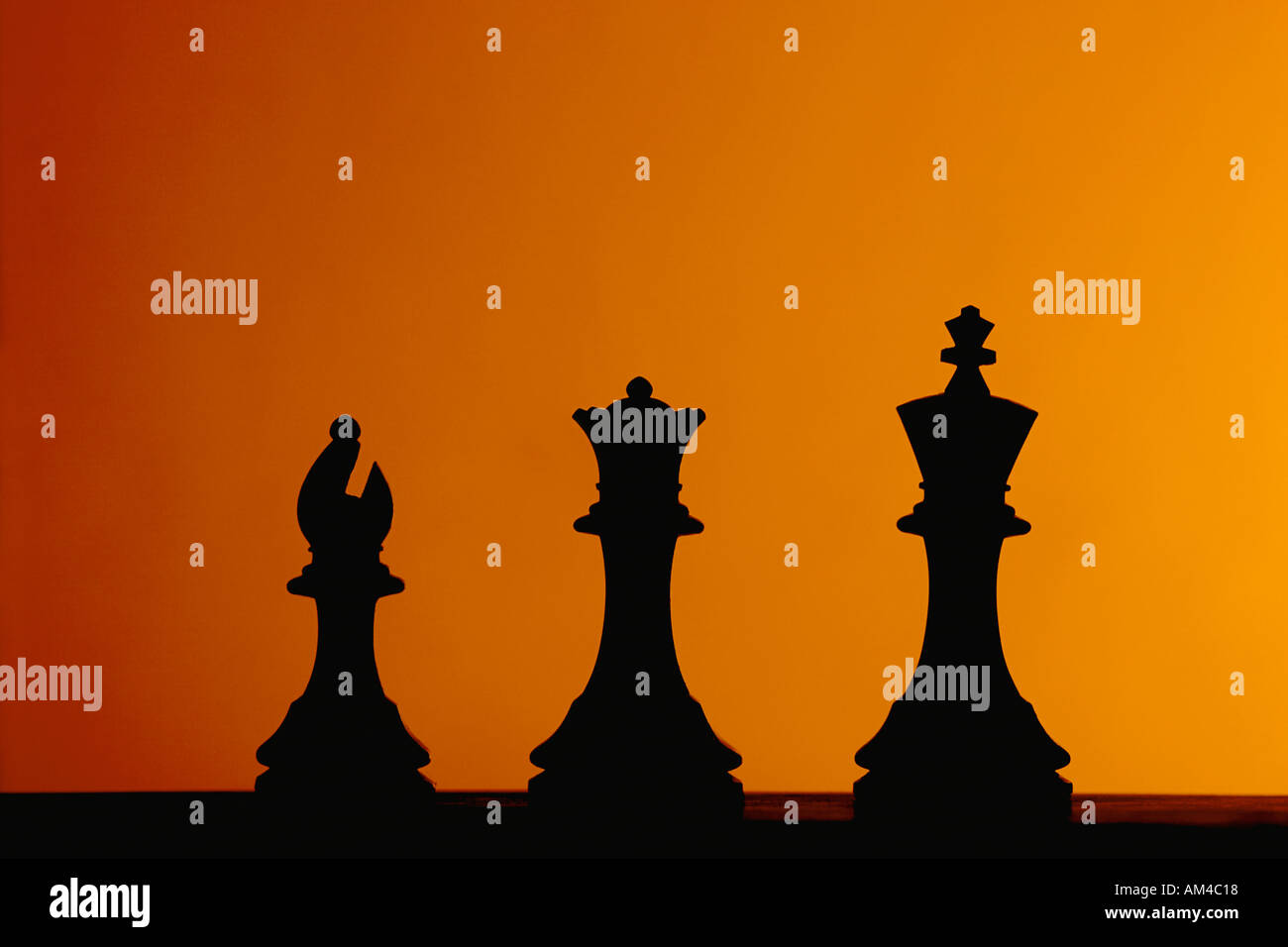 Row of chess pieces lined up Stock Photo - Alamy