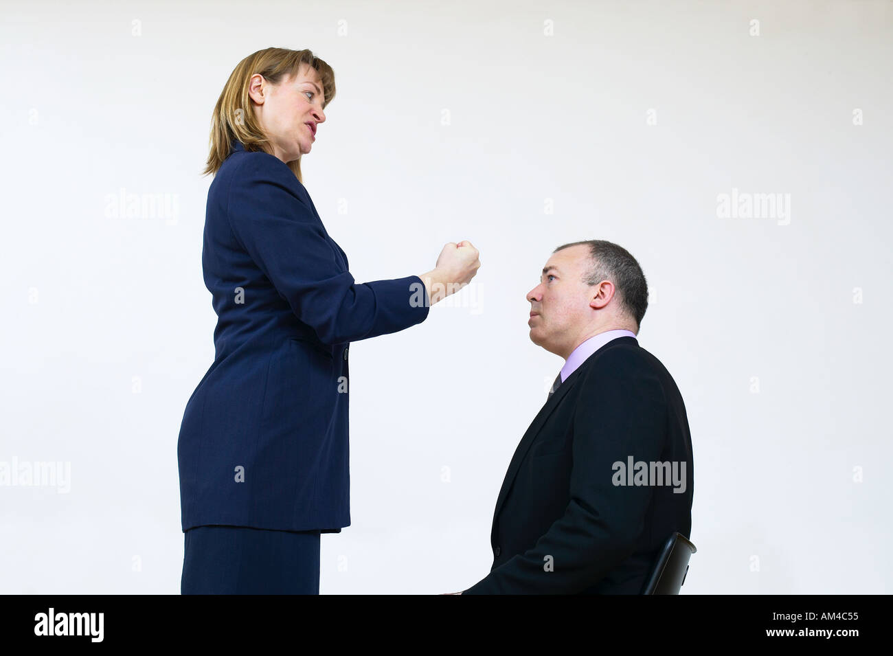business man and woman bully arguing Stock Photo - Alamy