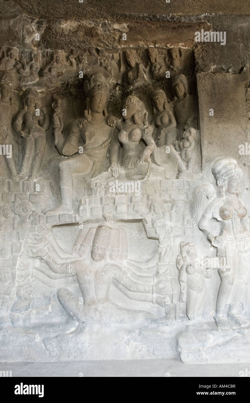 Statues carved on the wall in a cave, Ellora, Aurangabad, Maharashtra ...