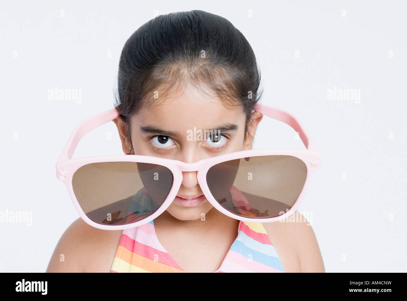 Portrait of a girl wearing sunglasses Stock Photo - Alamy
