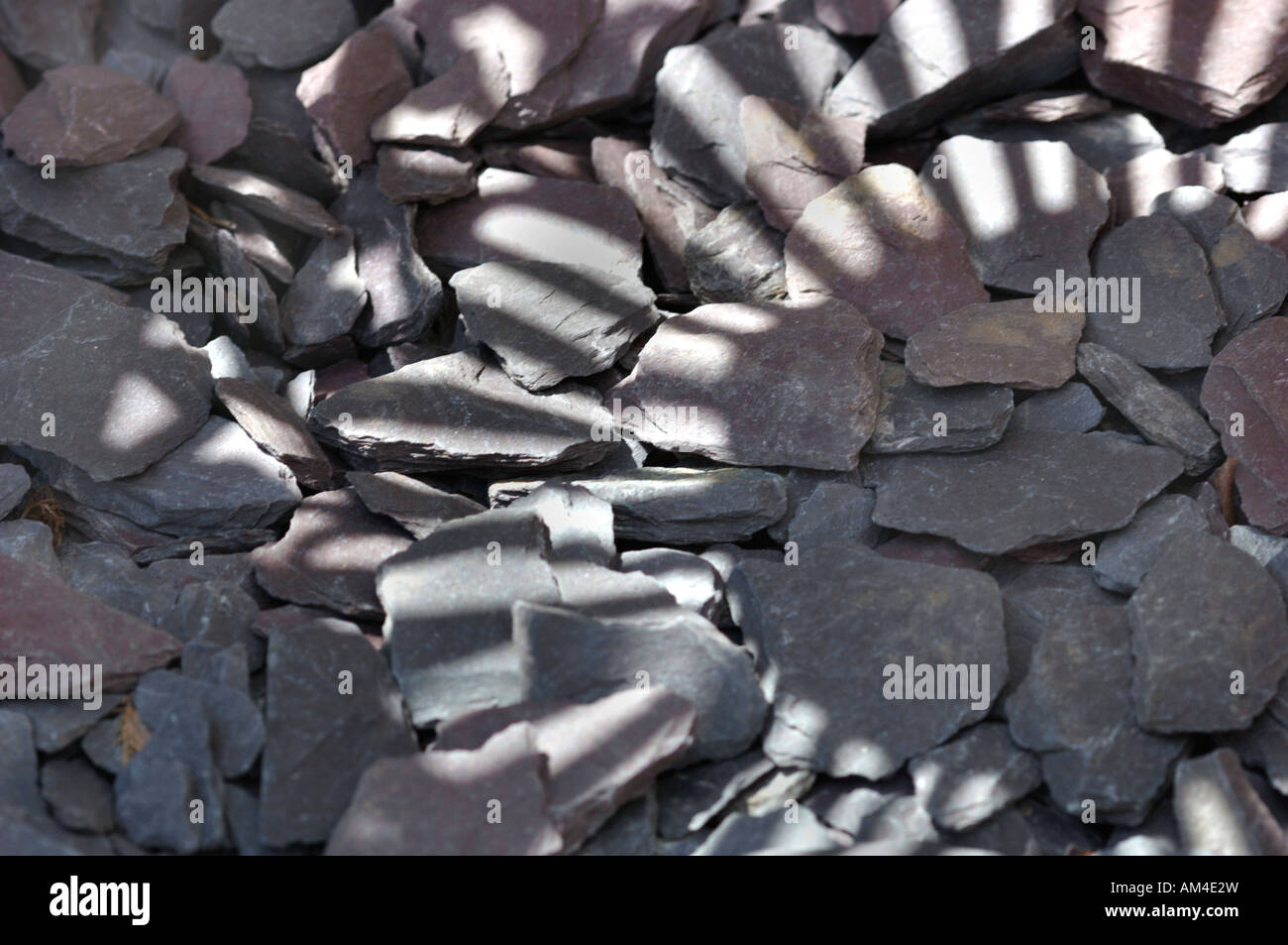 Abstract Light Patterns Falling Onto A Shale Garden Path Stock Photo ...