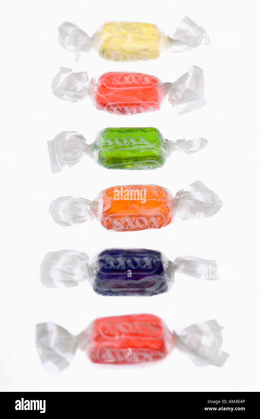 Close-up of candies in a row Stock Photo - Alamy