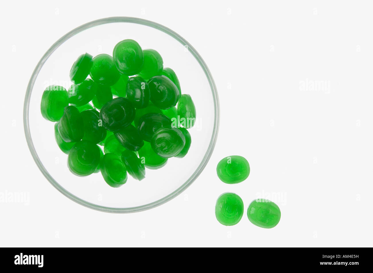 High angle view of green candies in a bowl Stock Photo - Alamy
