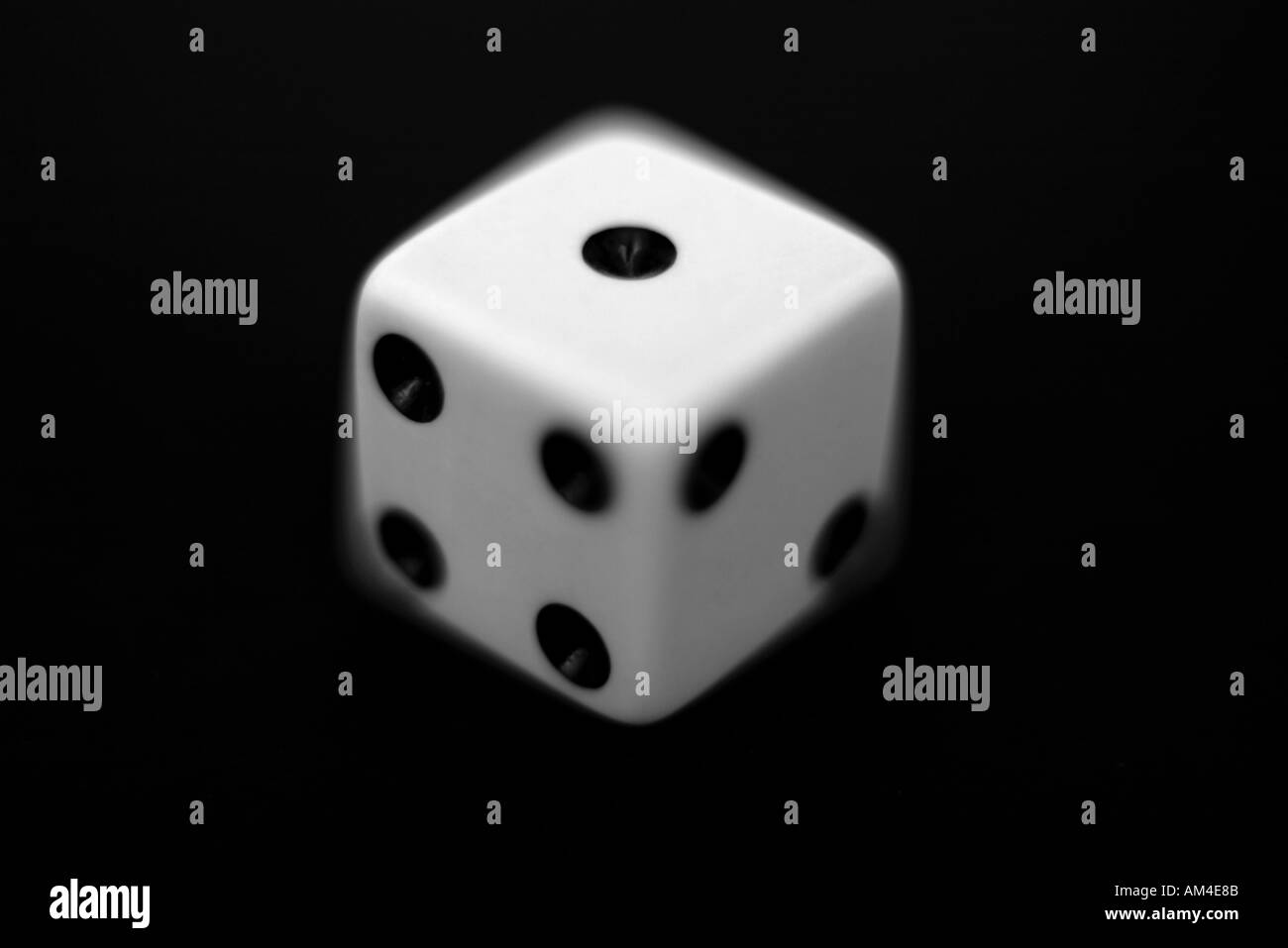 White dice showing number one Stock Photo - Alamy