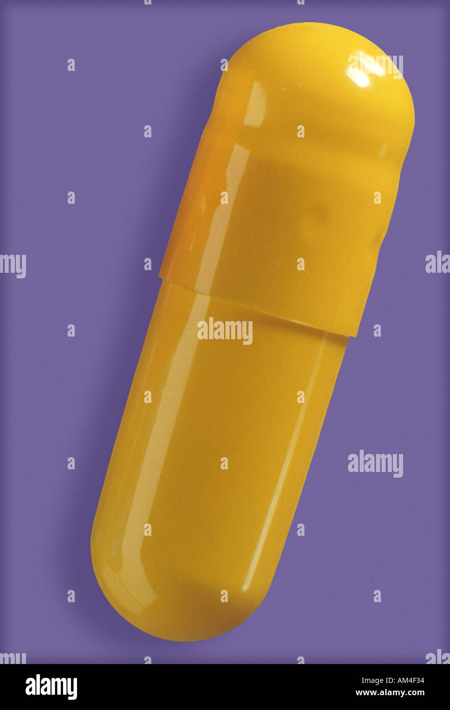 Yellow capsule hi-res stock photography and images - Alamy
