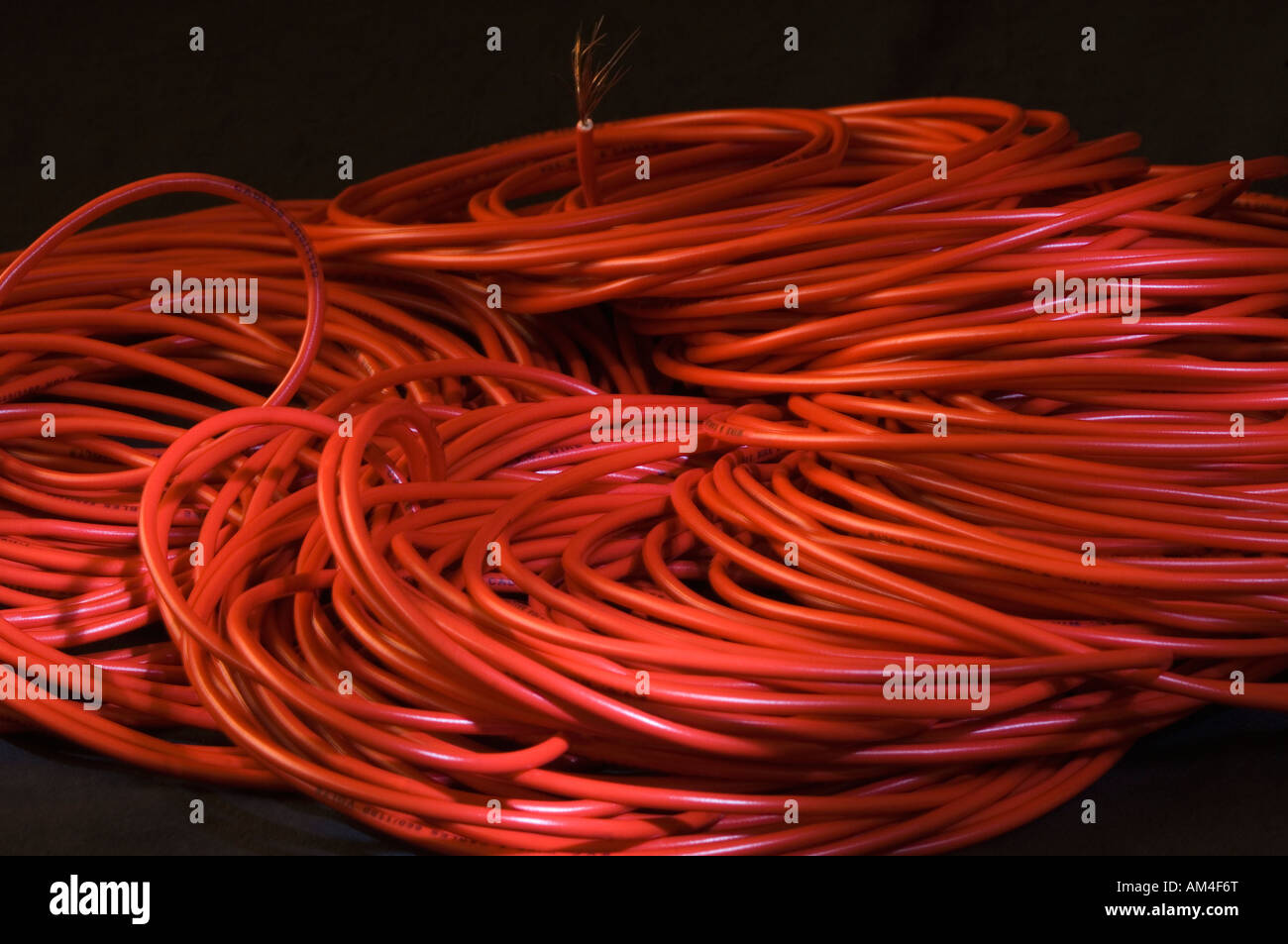 Close-up of red power cable bundles Stock Photo - Alamy