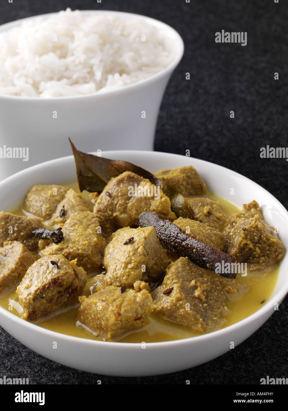 Indian lamb in yellow sauce with basmati rice editorial food Stock ...