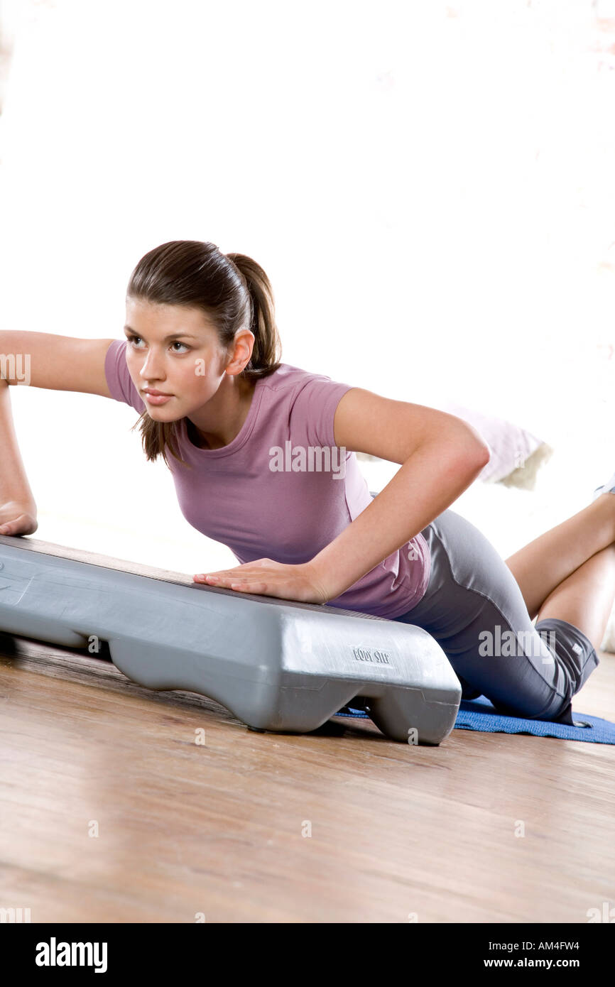 woman exercising with step Stock Photo - Alamy