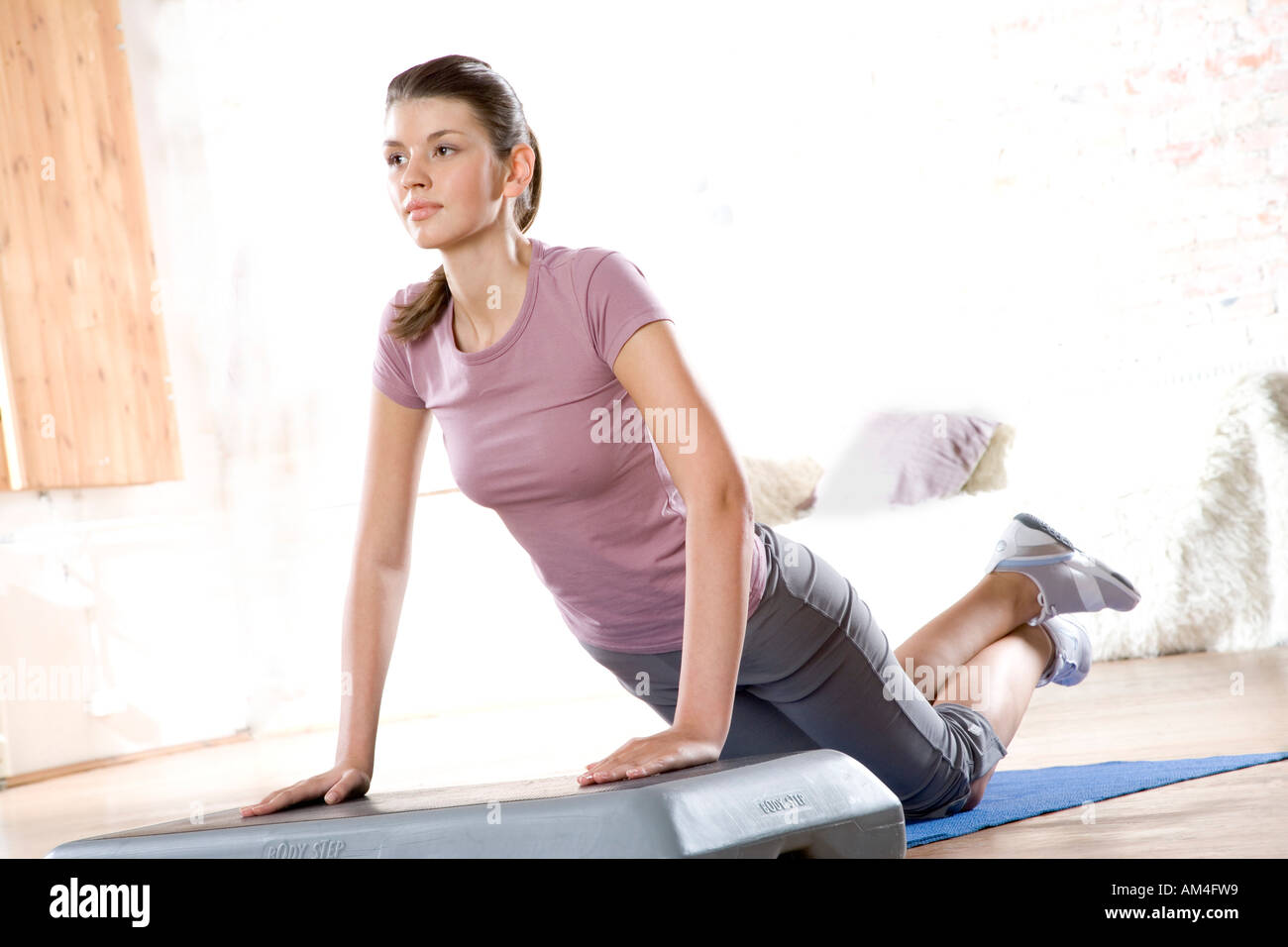 woman exercising with step Stock Photo - Alamy