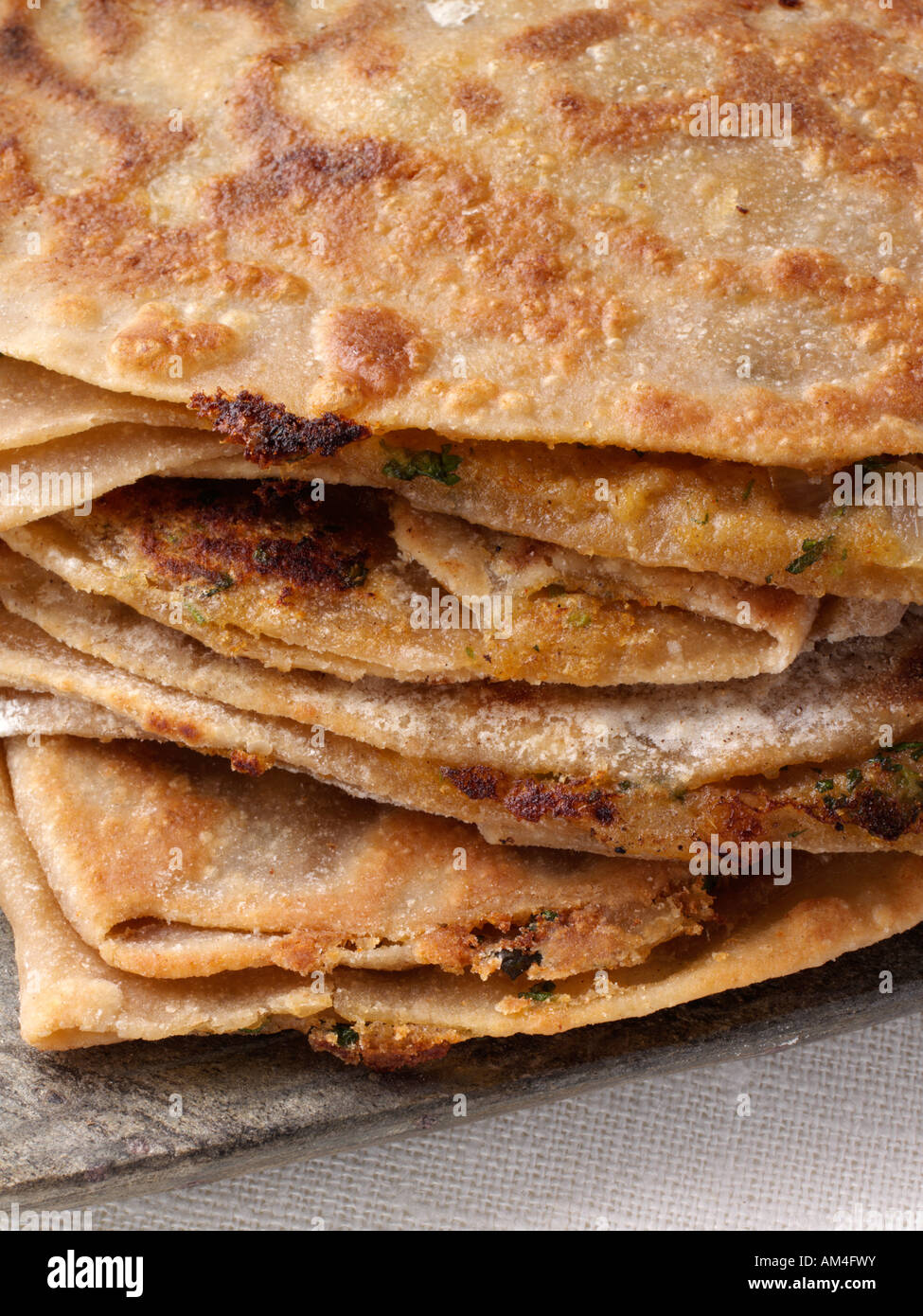 Griddle fried indian parathas hi-res stock photography and images - Alamy
