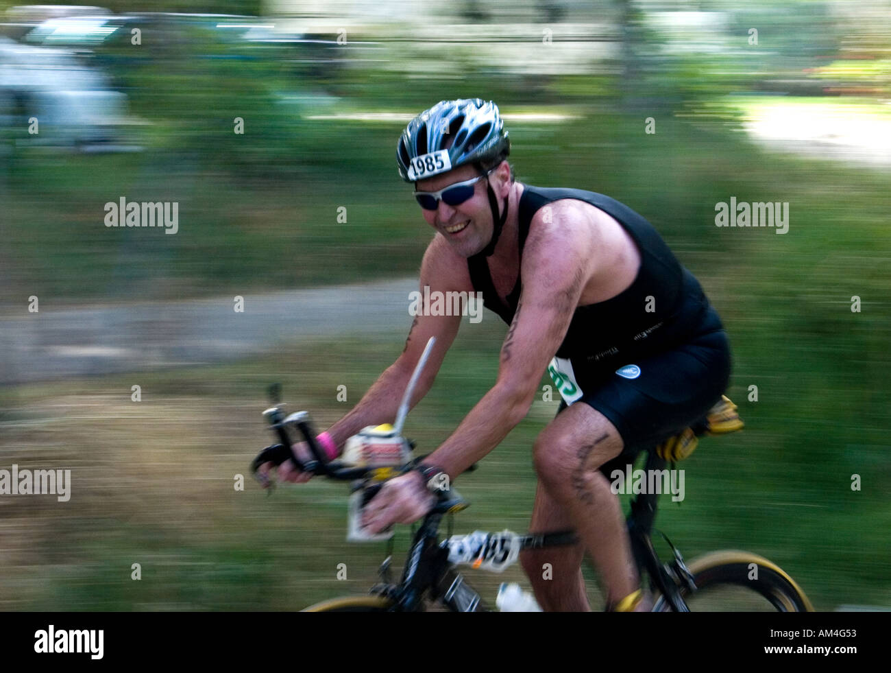 Mature man bike fast hi-res stock photography and images - Alamy