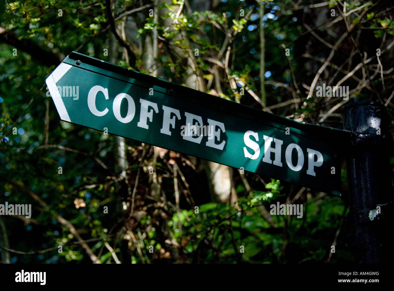 Signs towards coffee shop and toilets at a stately home Stock Photo - Alamy
