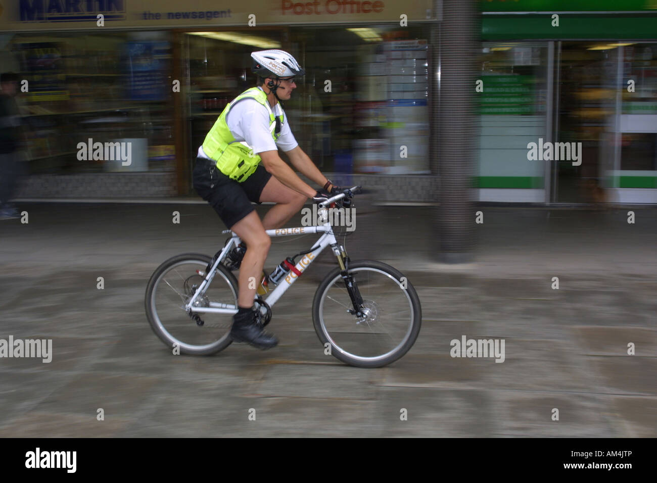 Policeman on a bicycle hi-res stock photography and images - Alamy
