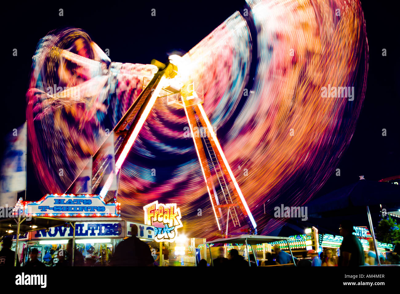 Carnival ride in motion at the 2007 Montgomery County Agricultural Fair ...