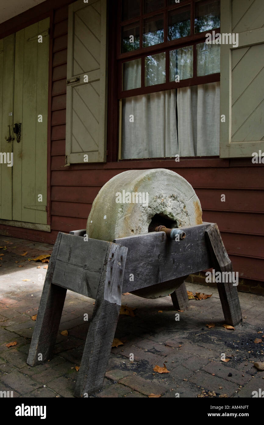 Stone grinding wheel used to sharpen tools in colonial times Stock ...