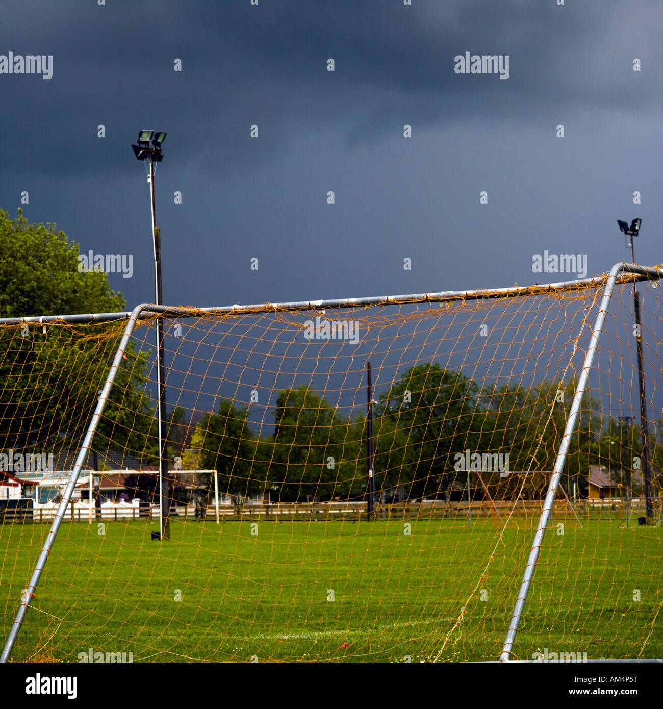 goal posts and dark sky Stock Photo - Alamy