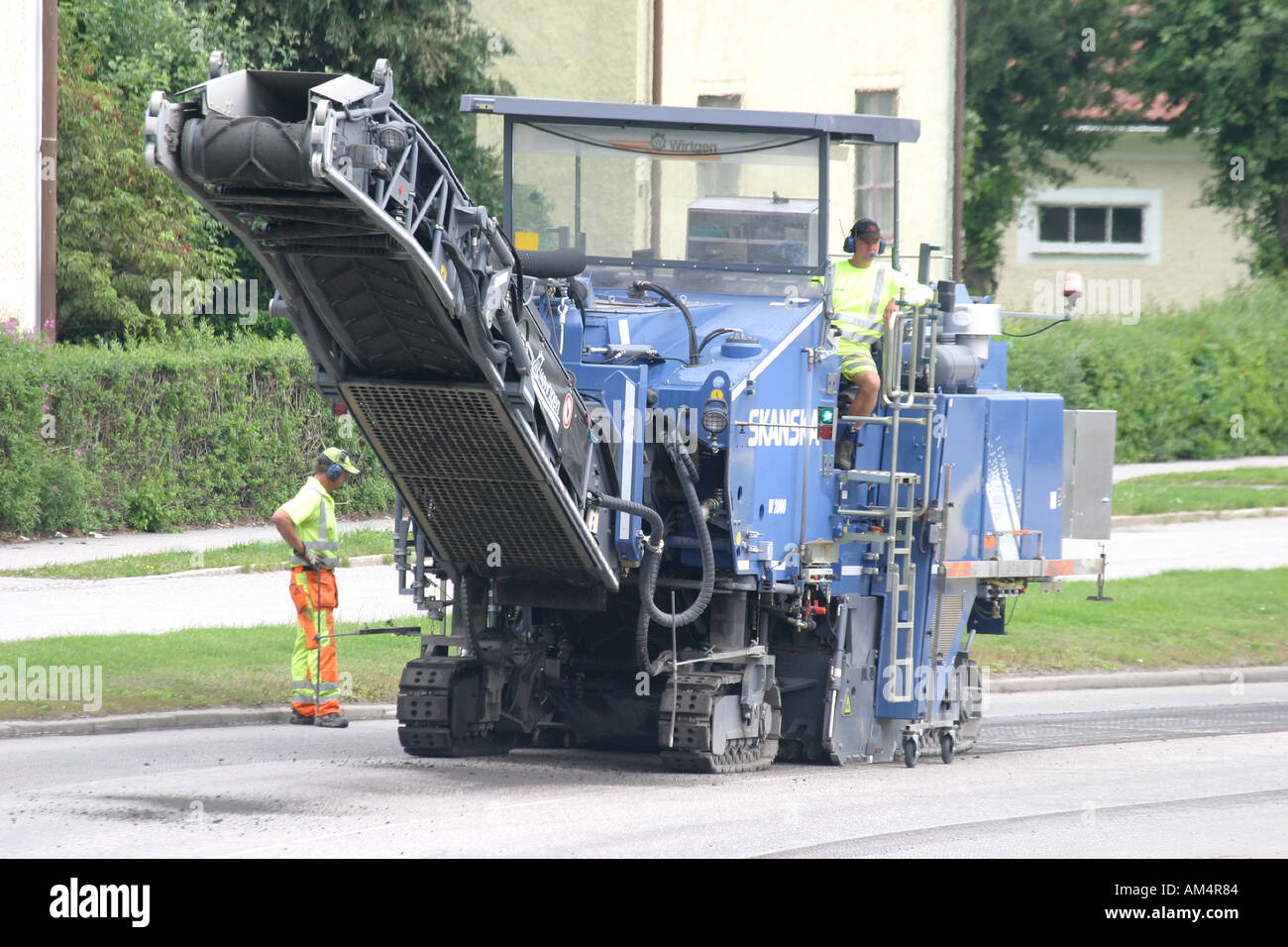 Asphalt worker on street Stock Photo - Alamy