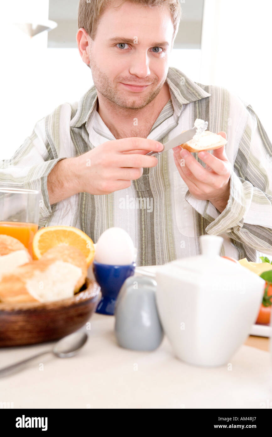 man spreading bread Stock Photo - Alamy