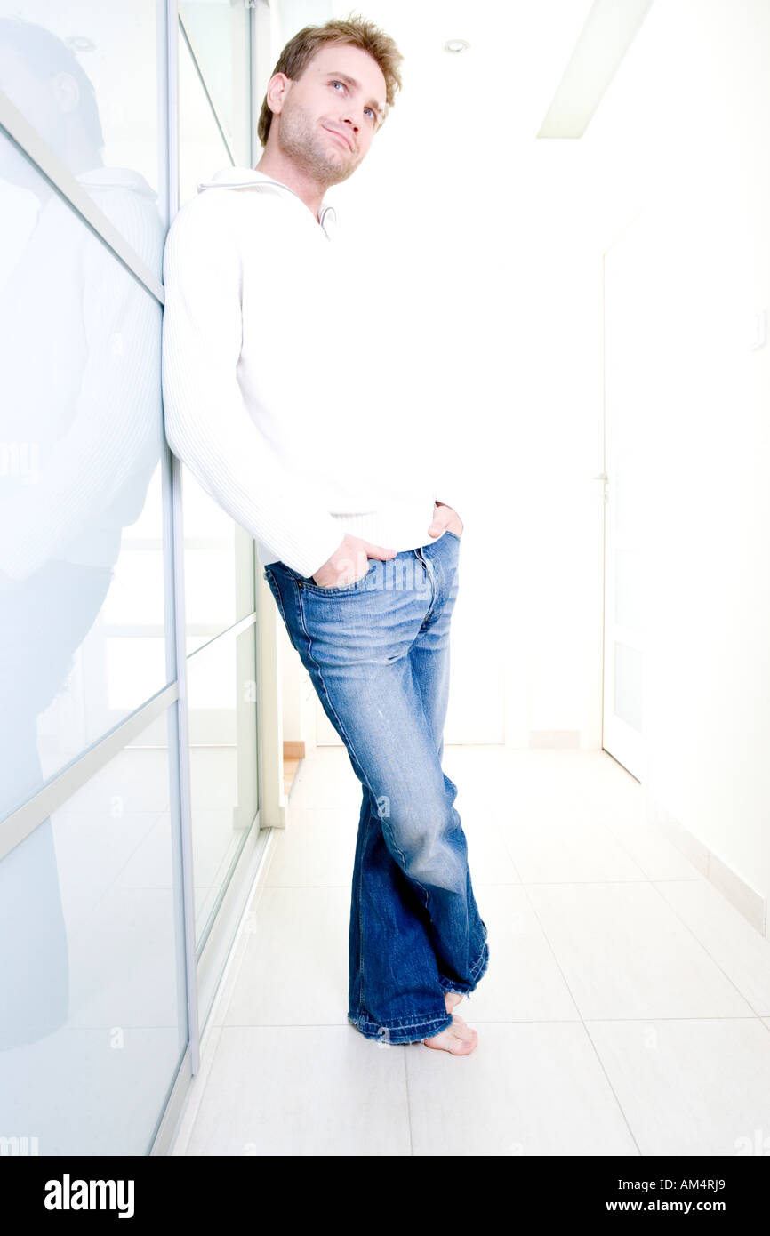 man standing in hall Stock Photo - Alamy