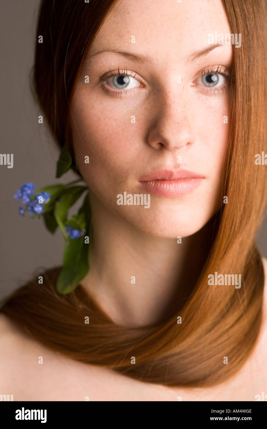 beauty woman with forget-me-nots Stock Photo - Alamy
