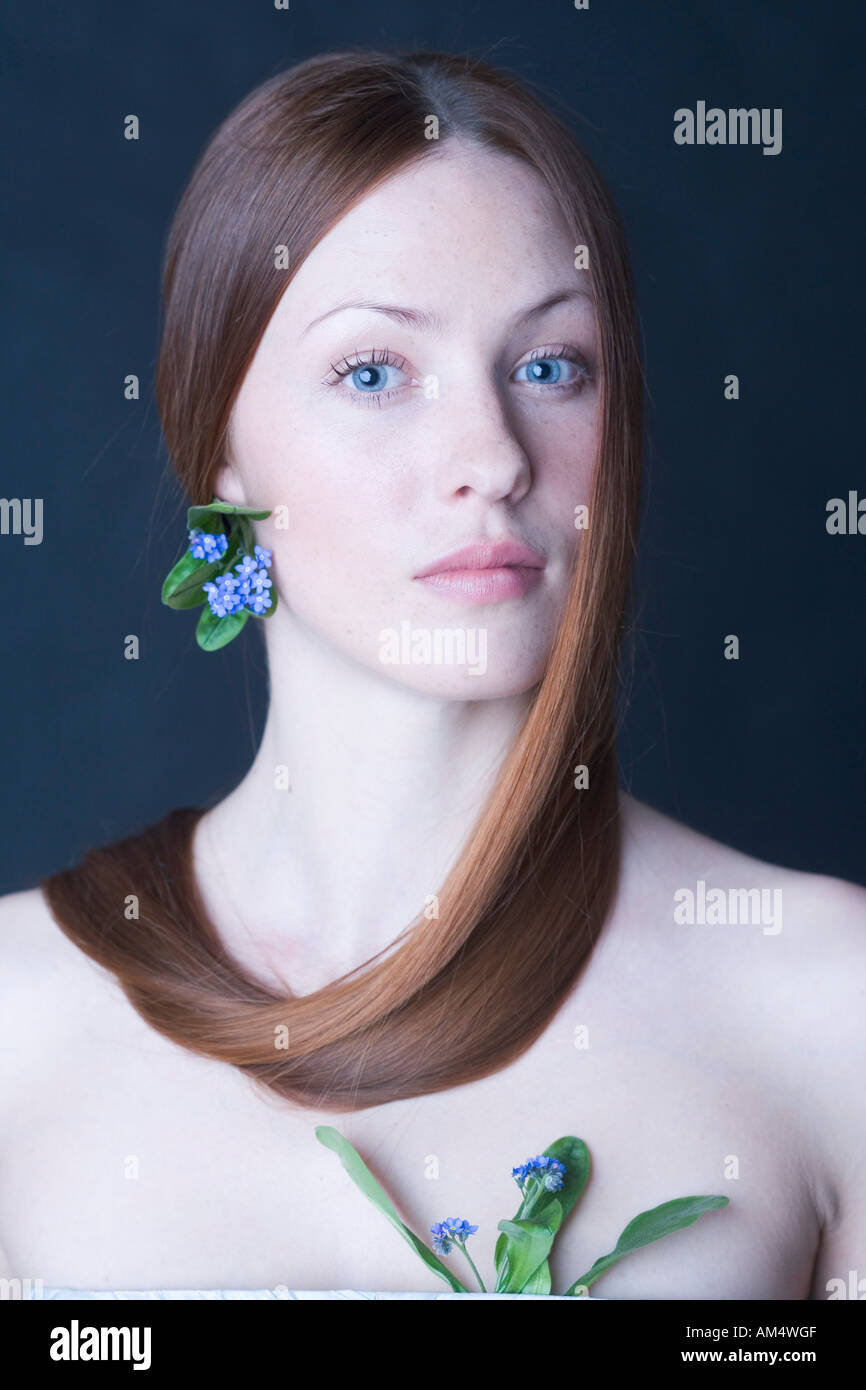 beauty woman with forget-me-nots Stock Photo - Alamy