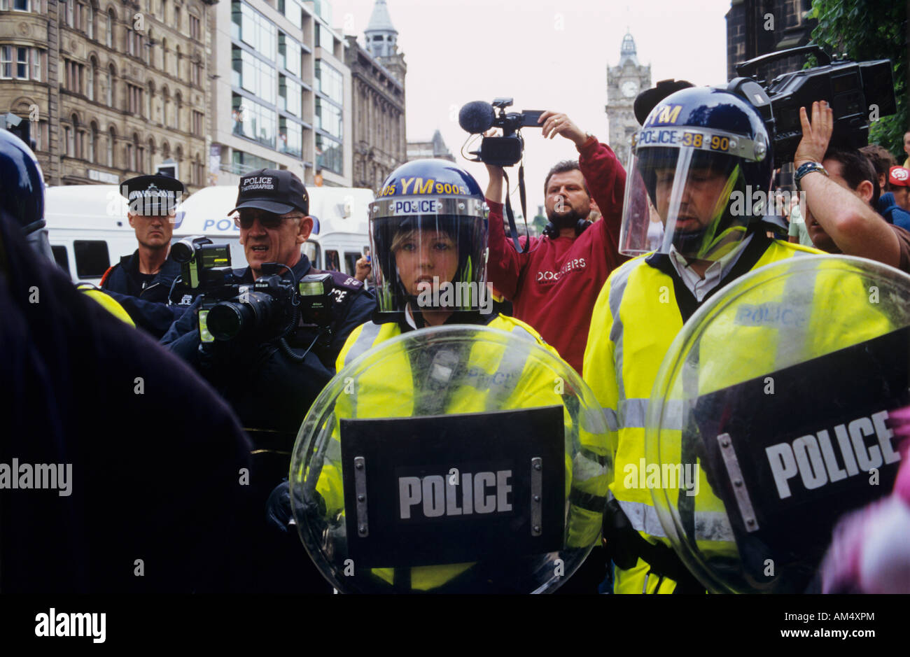 In Edinburgh, riot police and media crews faced a demonstration by ...