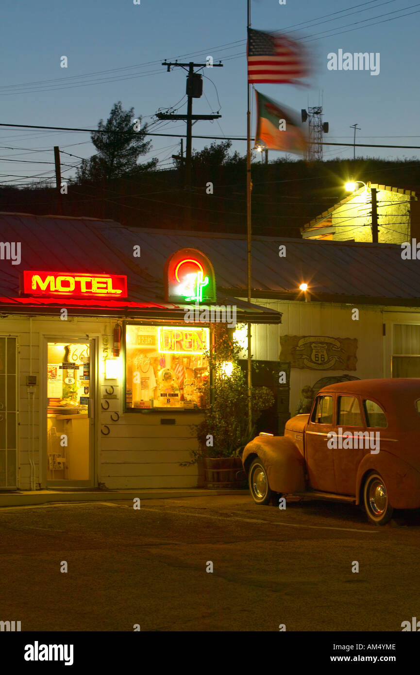 Route 66 neon sign and historic vintage roadside motel welcomes old ...