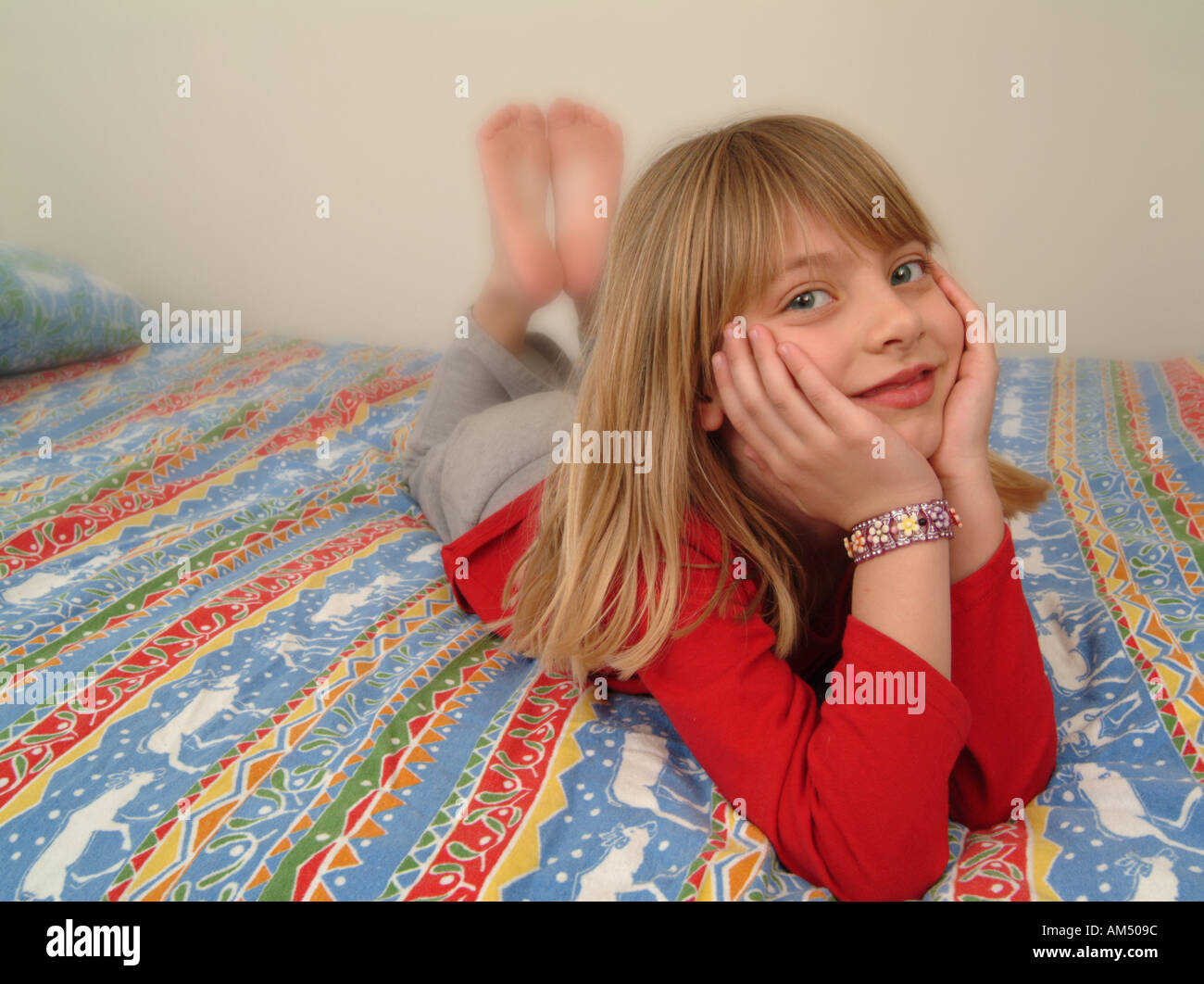 young girl playing in her room poses for a portrait Stock Photo - Alamy