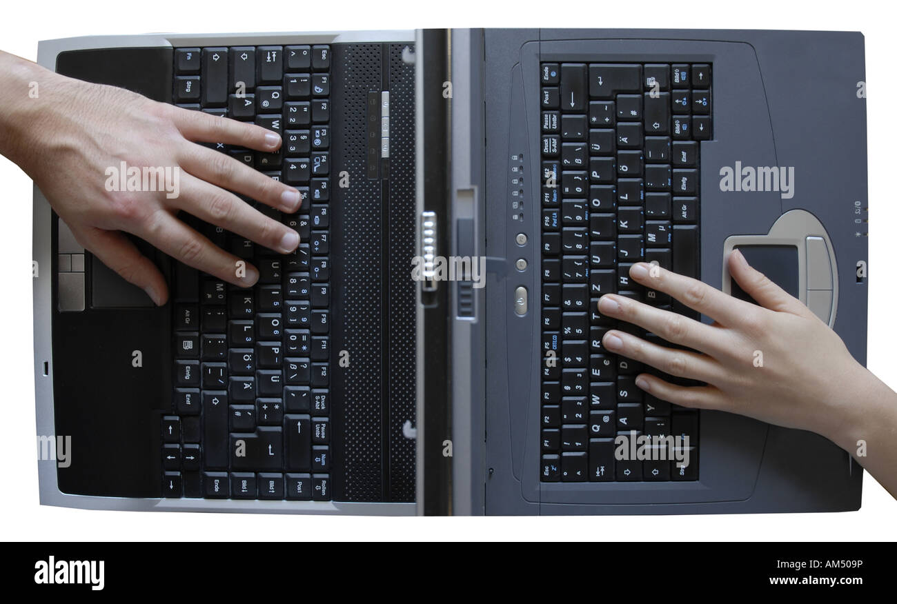 Two hands typing on laptop keyboards, topview, cut out Stock Photo - Alamy