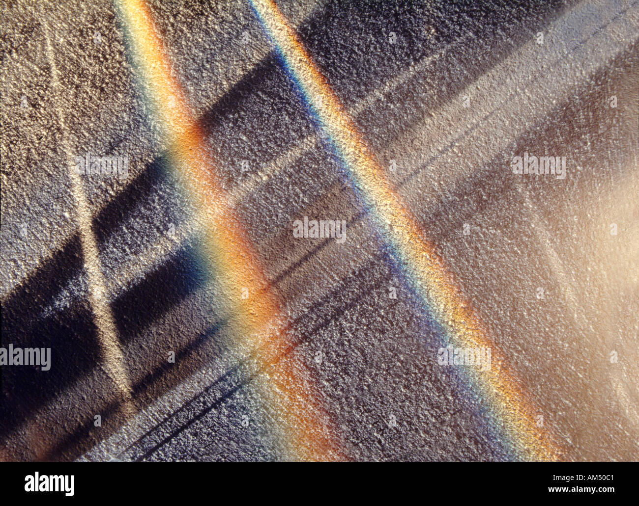 paper background with streaks of rainbow colored light for backgrounds ...