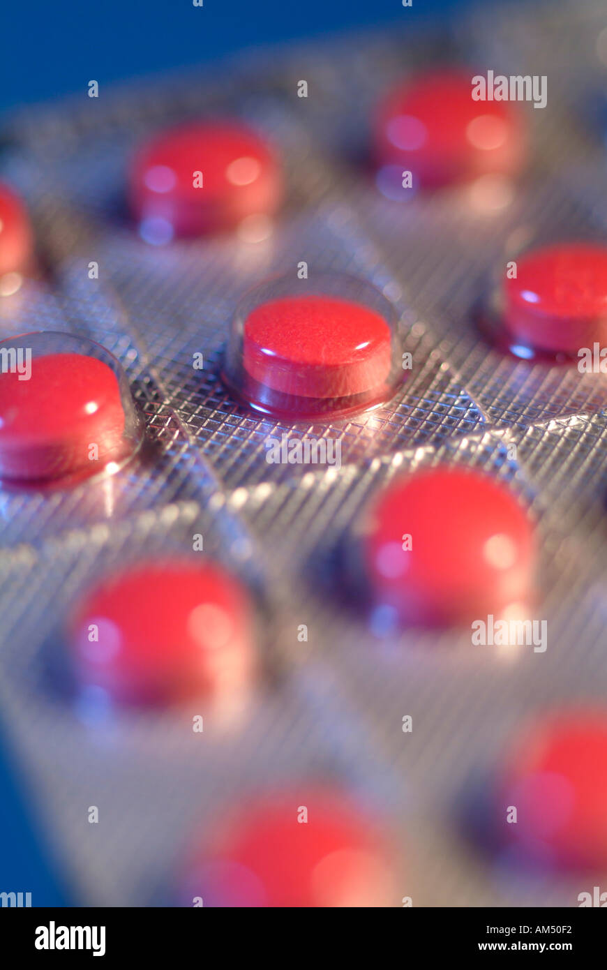 red tablets in a foil blister package Stock Photo - Alamy
