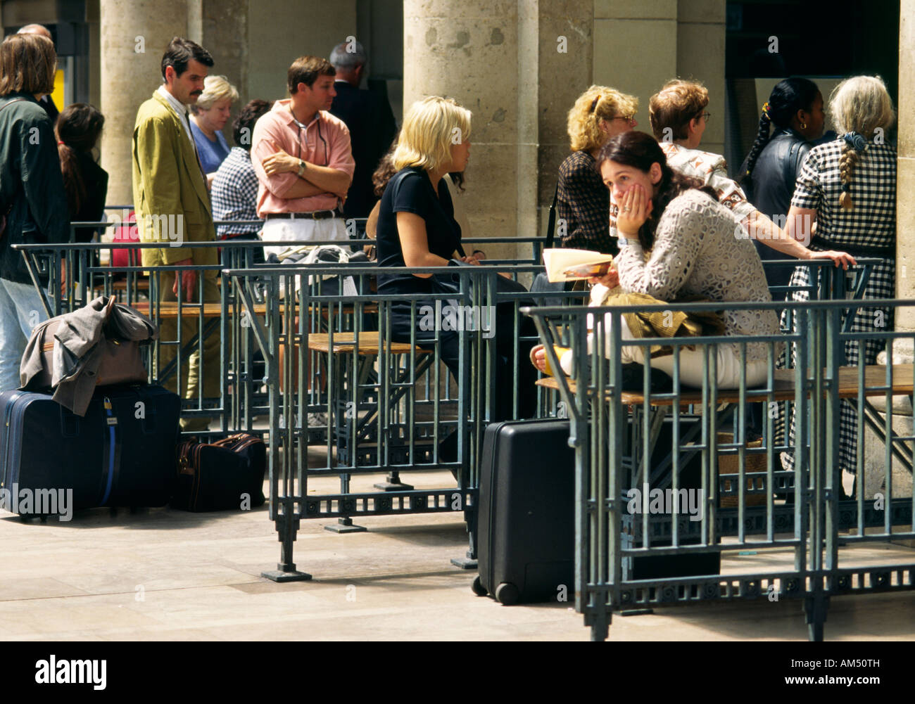 Train station Gare de l'Est Paris crowds in line at the ticket counter ...
