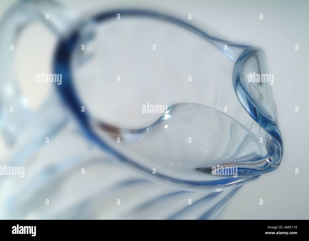 Fluted Blue Glass Pitcher detail Stock Photo - Alamy