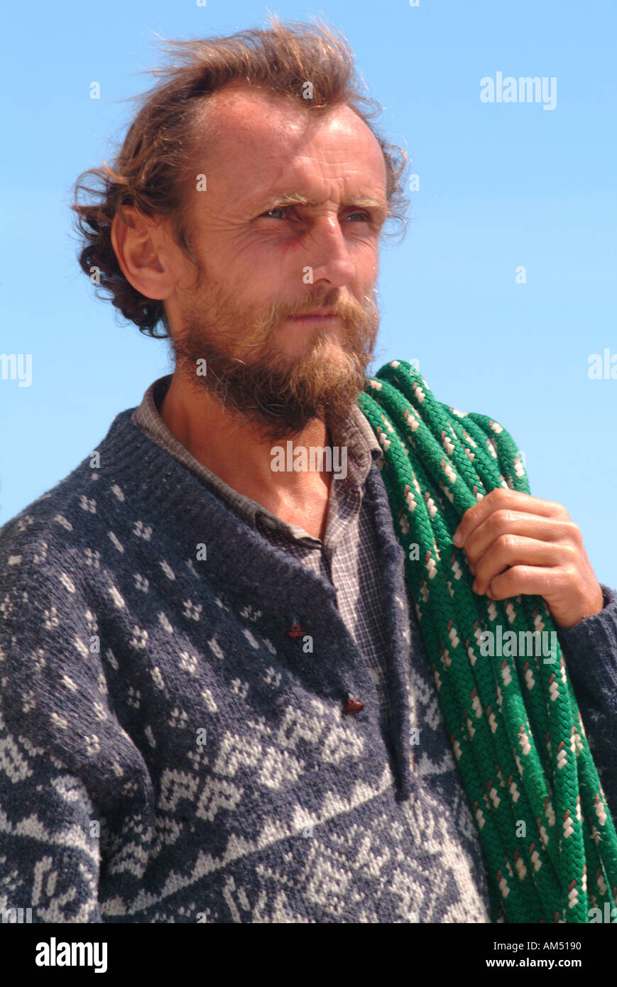 sailor with a coil of rope over his shoulder Stock Photo - Alamy