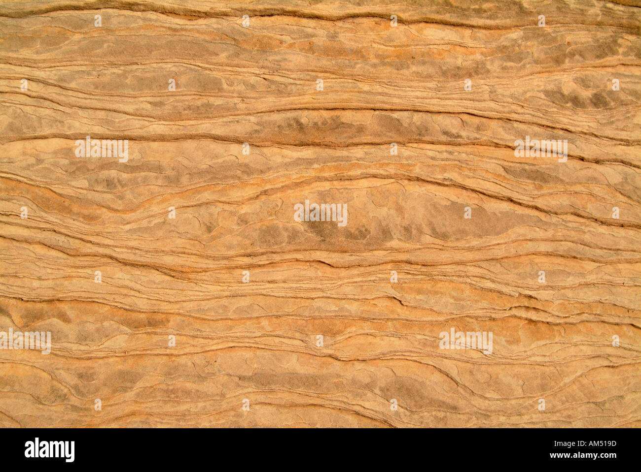 Orange colored layered sandstone background Stock Photo - Alamy