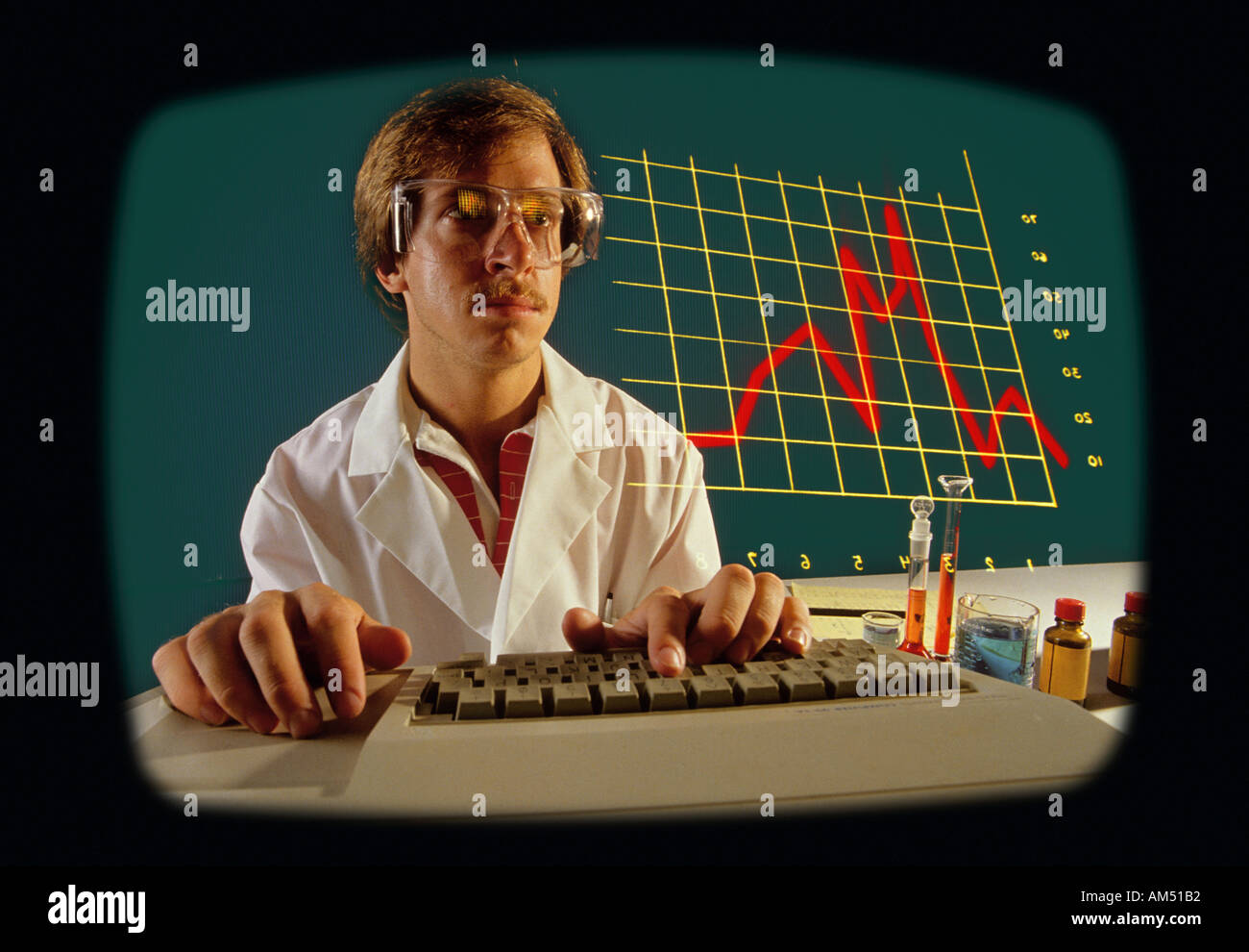research scientist looks at computer graph as seen from inside the ...