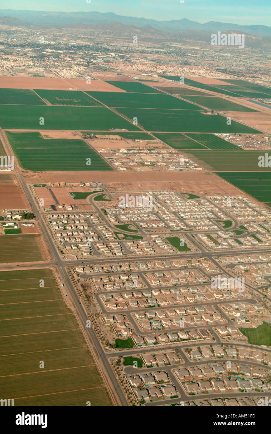 suburban sprawl over running farmland in the American southwest Stock ...