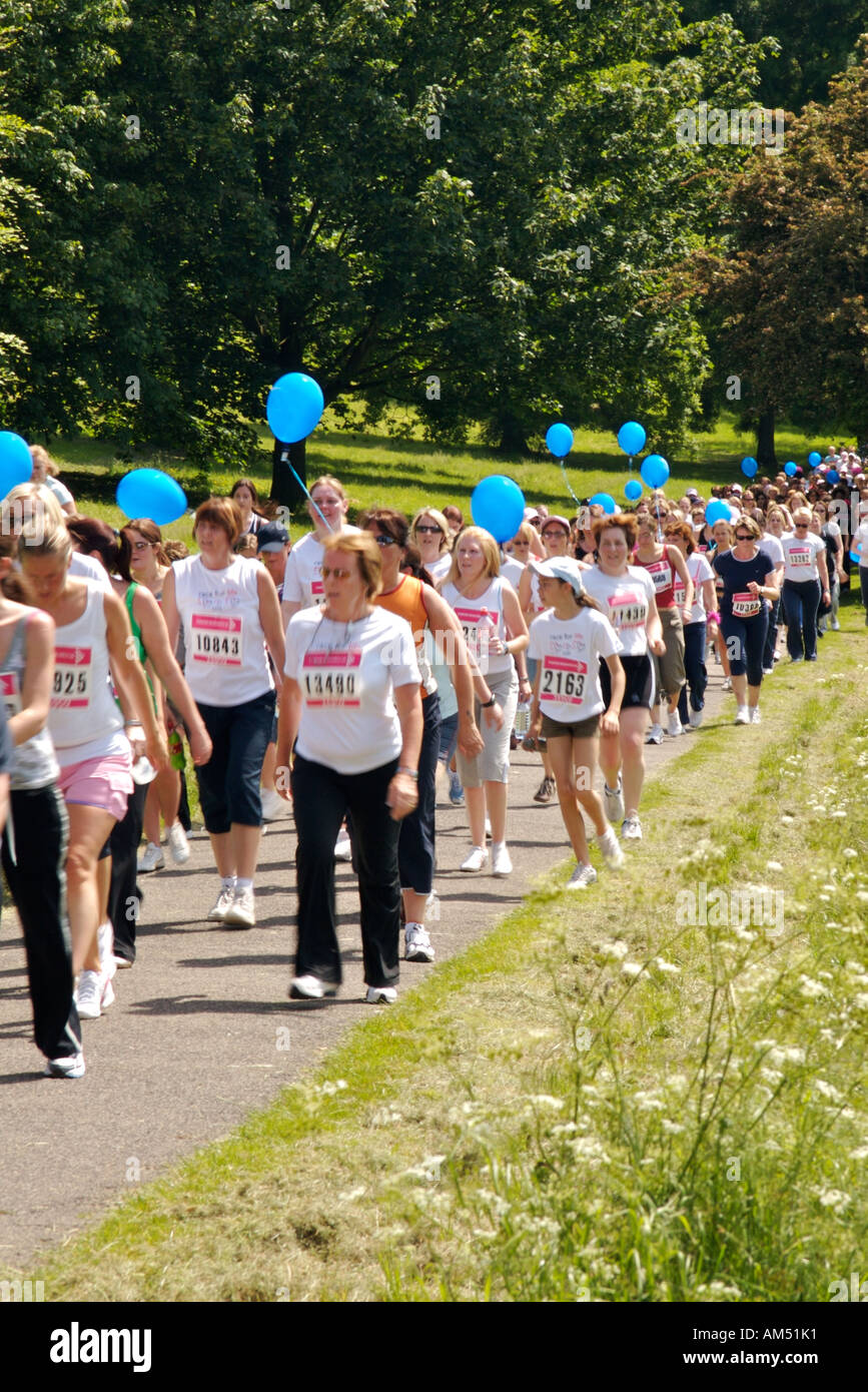 Runners in the 'Race for Life' sponsored run in Mote Park, Maidstone ...