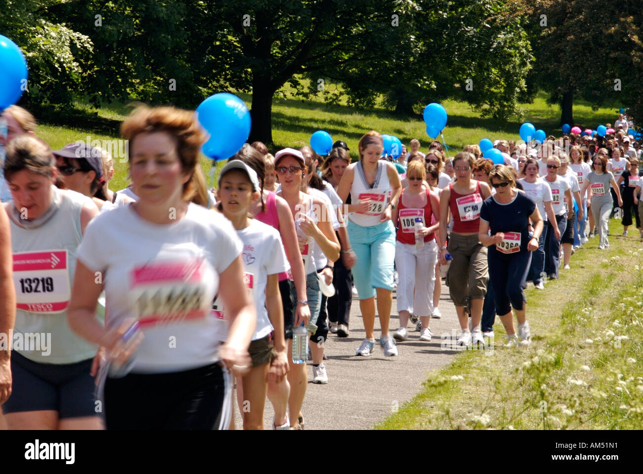 Runners in the 'Race for Life' sponsored run in Mote Park, Maidstone ...