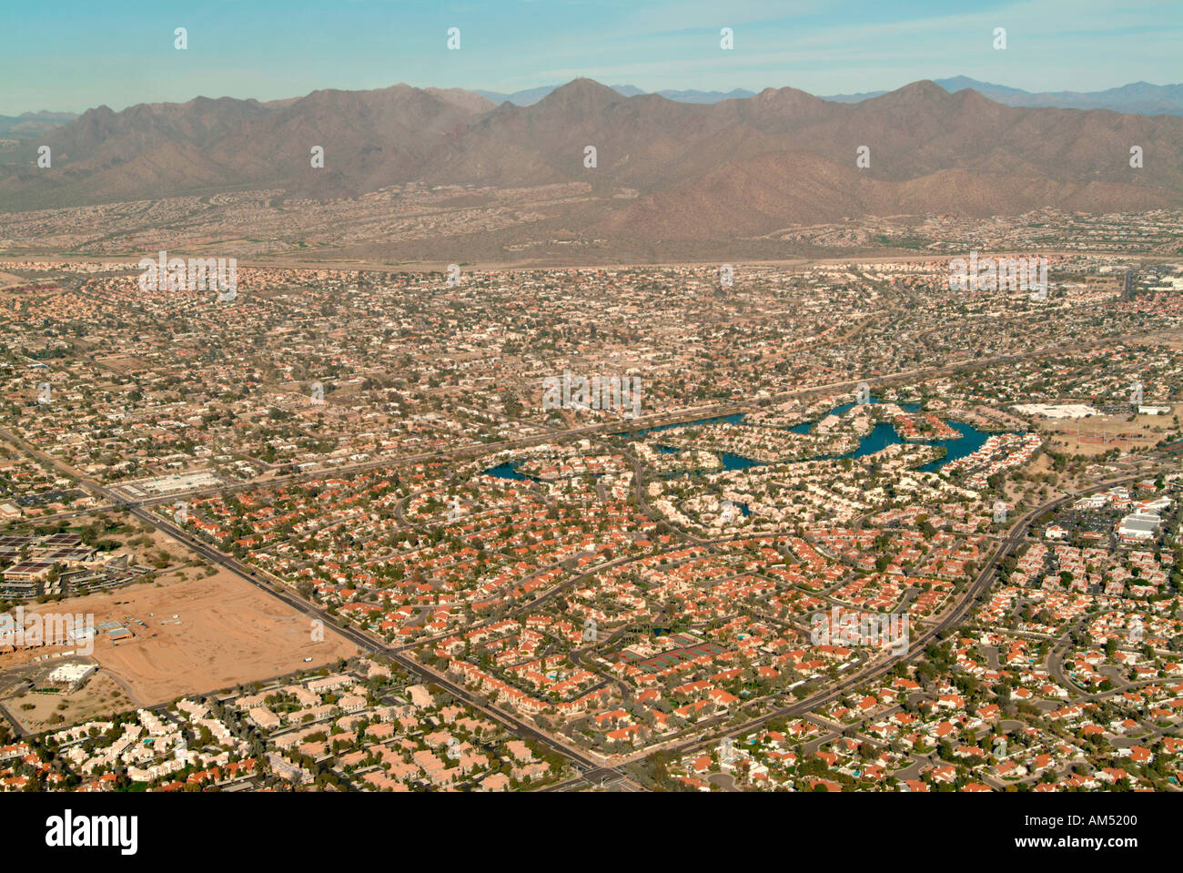 suburban sprawl over running farmland in the American southwest Stock ...