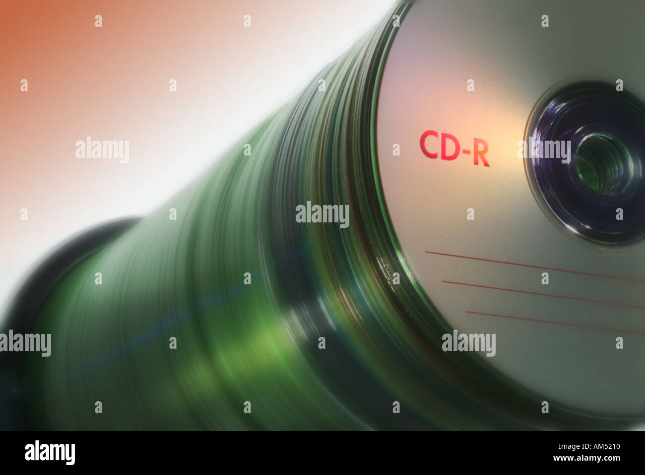 Very tall stack of CDs on a spindle Stock Photo - Alamy