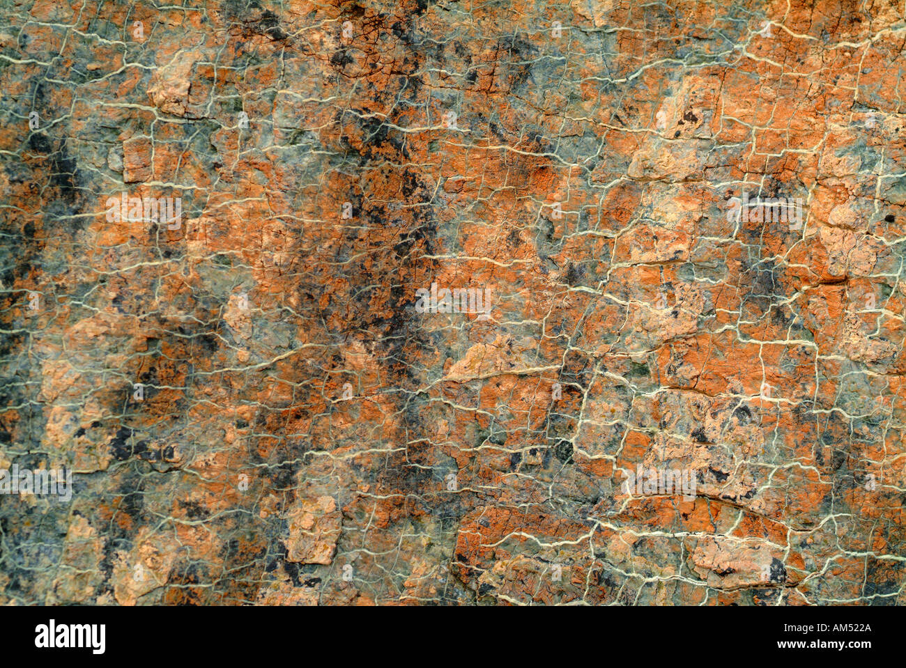 reddish cracked stone texture for backgrounds Stock Photo - Alamy