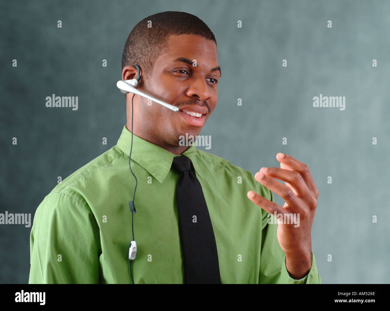 African American telemarketer or phone rep at work Stock Photo - Alamy